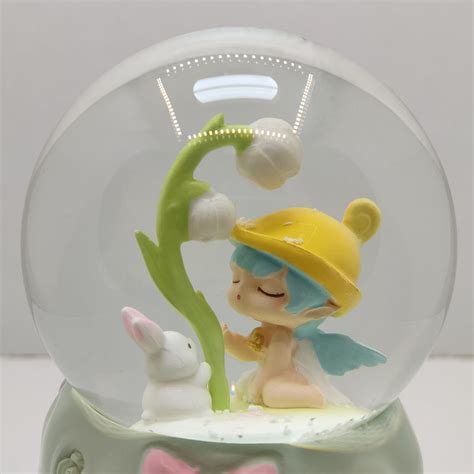 قیمت و خرید گوی موزیکال مدل چراغ دار طرح فرشته کوچولو و گل آرزو