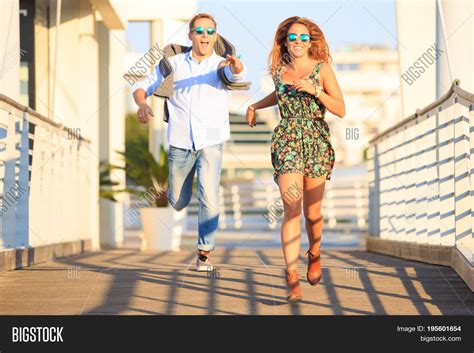 Girl Running Away From Guy