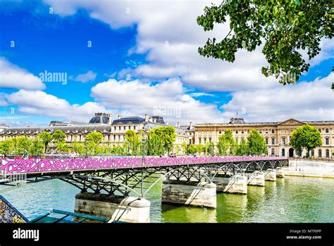 The Pont Des Arts Also Known As The Passerelle Des Arts Over The River