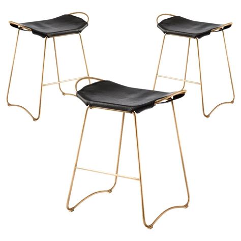 Set Of Four Klismos Swivel Brass Stools At 1stdibs