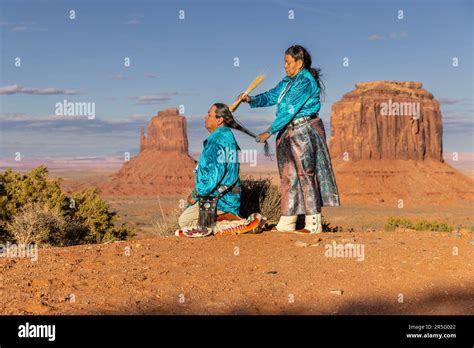 American Indian Navajo Hair Combing Ritual During Sunset At Monument