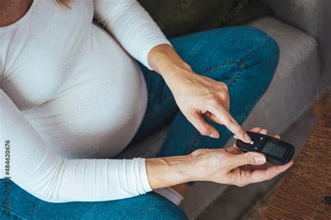 Diabetes Monitoring With Blood Sugar Test Glucose Measurement On Aged Woman Patient Fingertip