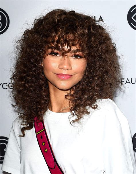 Flaunt Your Curls With These 20 Curly Hairstyles With Bangs Flaunt Your Curls With These 20 Curly Hairstyles With Bangs