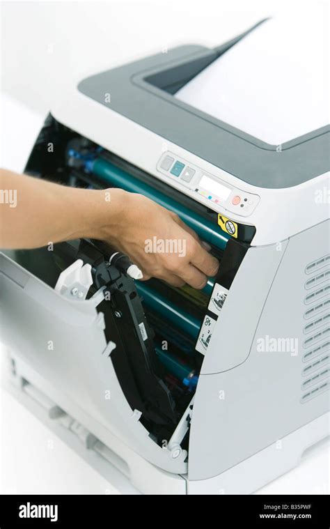 Person Fixing Paper Jam In Printer Cropped View Stock Photo Alamy