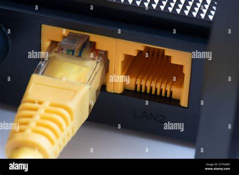 Network Cable Connected To Home Router Socket For Internet Connection