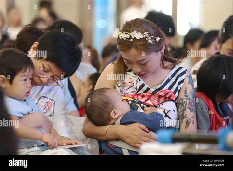 Chinese Mothers Attend An Event To Promote Breastfeeding On The