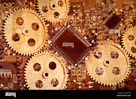 Gears And A Circuit Board With Processor CPU Of A Computer Symbolizing Mechanic And Digital