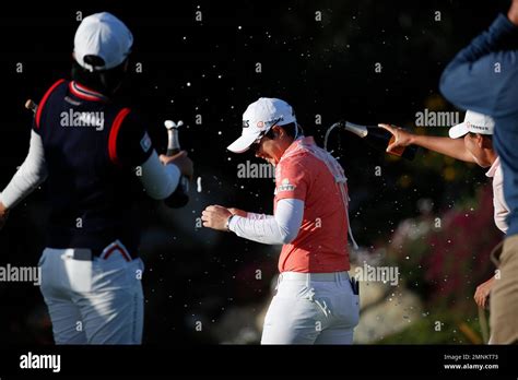 South Koreas Jeong Eun Lee Left And In Kyung Kim Spray Champagne On