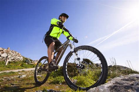 Mountain Biker Riding On His Btt Bike Stock Image Image Of Green