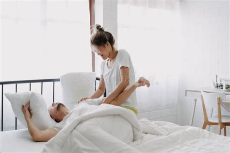 Funny Lovely Couple Wife Trying To Wake Husband Up In The Morning Stock Image Image Of Cozy