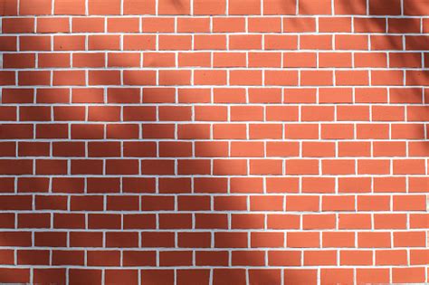 레드 어반 브릭 월은 아름다움 패턴과 질감으로 햇빛에 있습니다 복사 공간이 있는 배경입니다 일몰에 추상적 인 실루엣과 창조적 인 빈 템플릿 0명에 대한 스톡 사진 및 기타