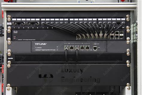 Connecting Data Switches Using Patch Cords To Patch Panels In A Low Current Rack In A Data