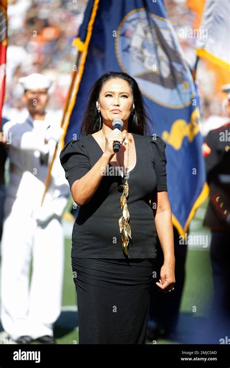 Actress Tia Carrere Sings The National Anthem At The Start Of A