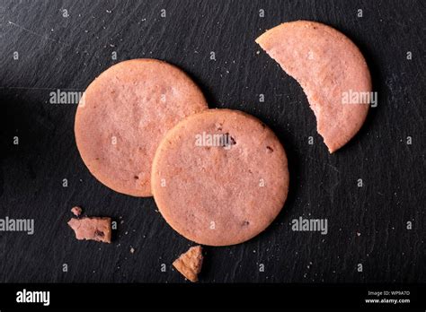 Sweet Raspberry Biscuits On A Dark Slate With Crumbs Top View Stock
