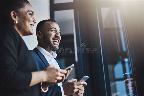 Business Man And Woman With Phone In Office For Internet Connection Meeting Break And Checking