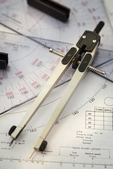 Above Image Of A Navigator S Radar Plotting Chart With A Triangle And Compass Divider Stock