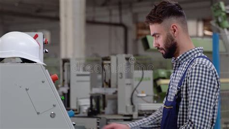Industrial Programmer Checking Control Box Status With Computer Stock