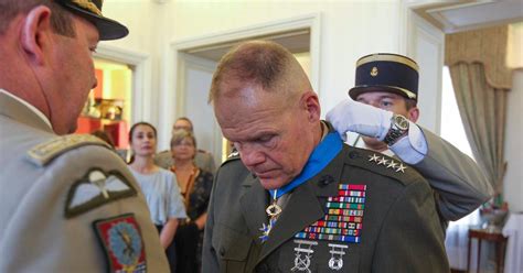 Commandant Awarded French National Order Of Merit