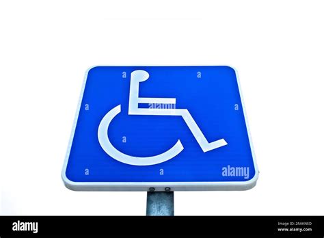International Symbol Of Access ISA Sign Low Angle View Against Pale Sky Stock Photo Alamy