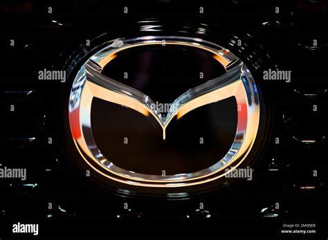 Mazda logo emblem sign Stock Photo - Alamy