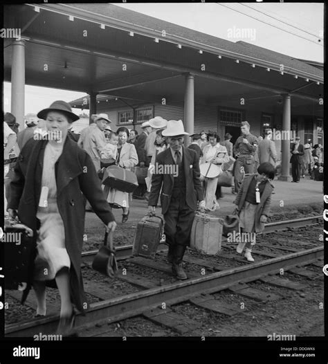 In Woodland California Families Of Japanese Ancestry Are Seen Leaving