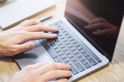 In A Close Up Shot A Man S Hands Are Seen Deftly Typing Stock Image Image Of Networking