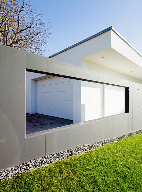 Philipp Architektens All White House M Frames A Sunken Swimming Pool