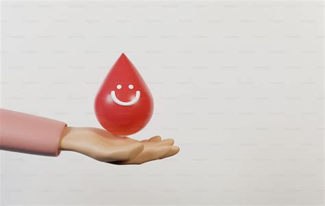 하얀 배경에 웃는 얼굴로 핏방울 아이콘을 들고 있는 손 세계 헌혈자의 날을 맞아 헌혈을 돕기 위해 자원 봉사하십시오 3d 렌더링 그림입니다 사진 Unsplash의