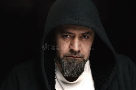 Mysterious Man Wearing Hoodies On A Dark Background Handsome Model Wearing Black Hoodie On A