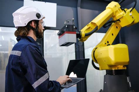 engineer working in robotics factory stock image image of development