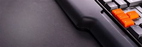 Premium Photo Orange Arrow Keys On A Black Keyboard Up Down Left Right Buttons On A Gaming