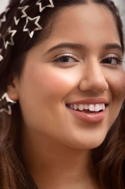 Premium Photo Portrait Of Hispanic Girl Smiling On Camera