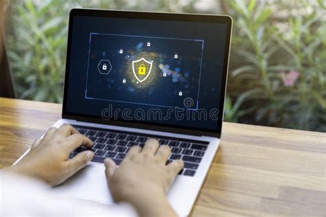 Person Using A Laptop Computer With Data Protection Cyber Security