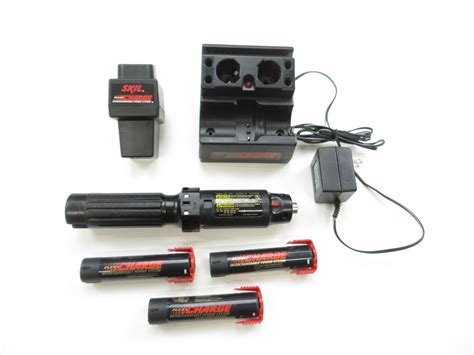 Skil Cordless Screw Driver And Charging Stations Lot