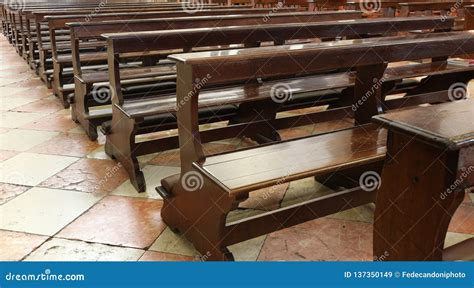 Wooden Church Pew Bench With Kneeler Inside A Christian Church Stock