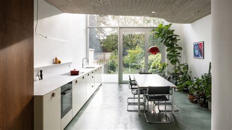 Memo Architectuur Organises Home Renovation Around Spiral Staircase Memo Architectuur Organises Home Renovation Around Spiral Staircase