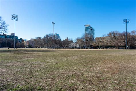 An Open Grass Field At Rainey Park In Astoria Queens New York With The