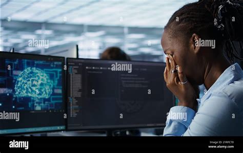 Tired Software Developer Having Eye Strain While Working On High Tech