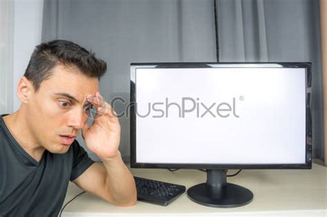 Man Pointing At A Computer Screen Stock Photo 2034125 Crushpixel