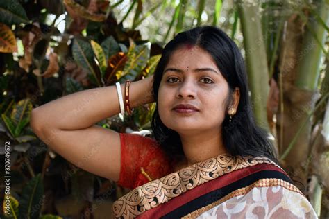 Portrait Of A Beautiful Indian Housewife In The Traditional Clothing On