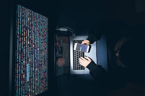 Premium Photo Cyber War Hacker Breaking Security Anonymous Person