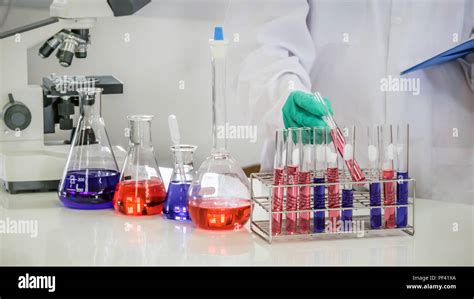 Scientist With Equipment And Science Experiments In Laboratory Stock