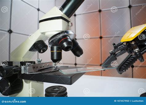 Microscope Slide In Robot Arm And Science Microscope Stock Photo Image Of Manufacture Medical