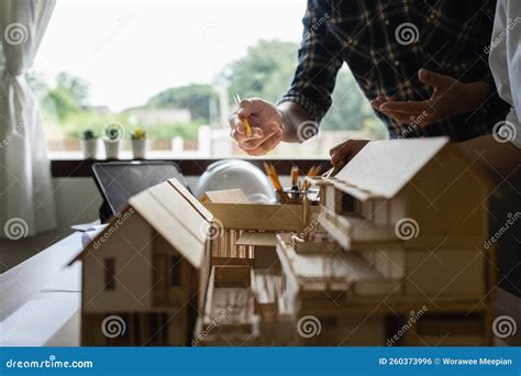 Architect Man Working With Blueprints For Architectural Plan Engineer