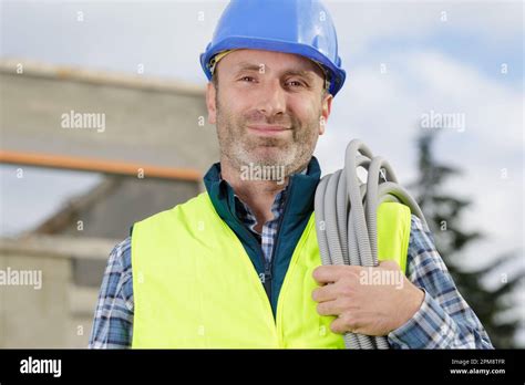 A Man Before Connecting Cables Stock Photo Alamy