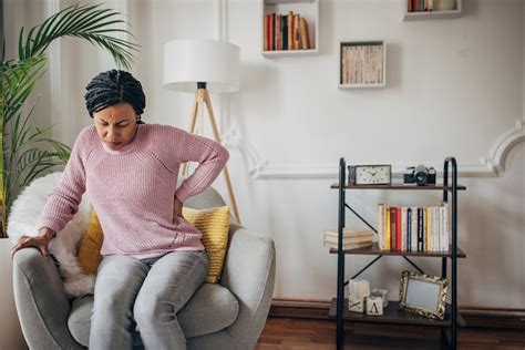 Stiff Back Causes Symptoms And Treatment