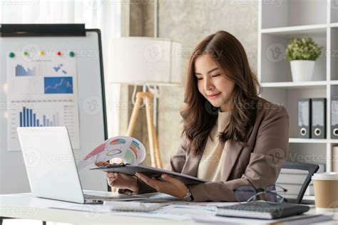 Cheerful Business Lady Working On Laptop In Office Asian Happy