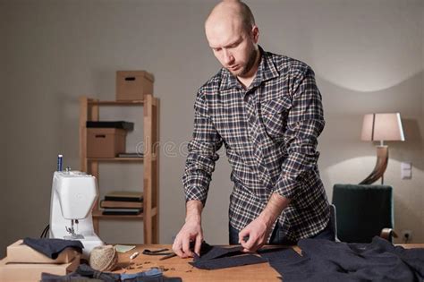 tailor cutting wool fabric the line pattern craftsman makes