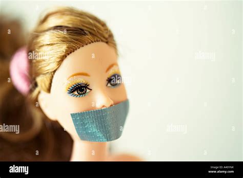 Barbie Doll With Gaffa Tape Over Mouth Stock Photo Alamy