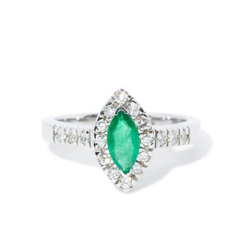 At Auction 056 Carat Emerald And Diamond Ring